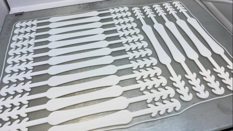 3D Anatomic Modeling Lab printing ear-loop mask attachments for staff ...